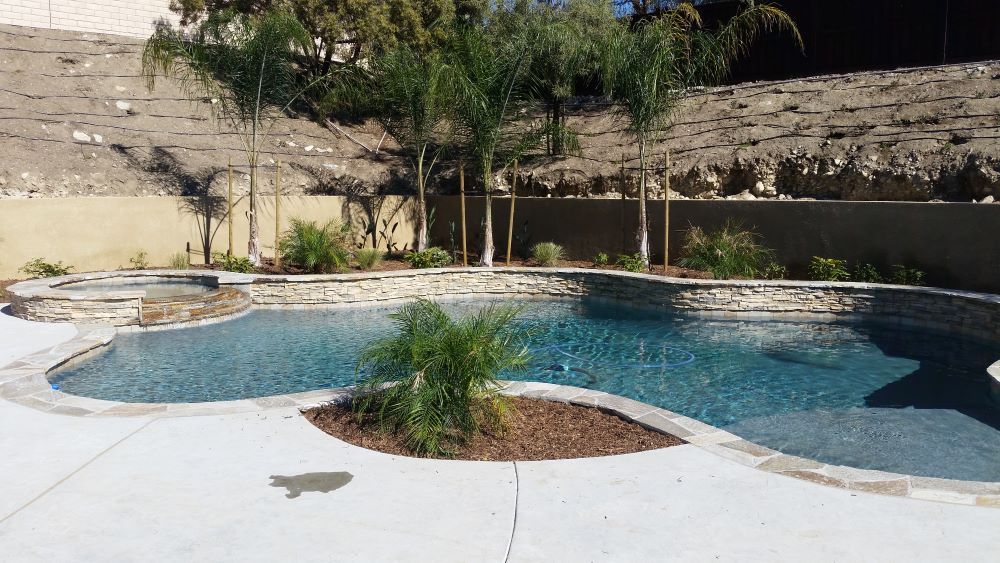 Building a Stunning Swimming Pool on a Slope - Infinite Pools