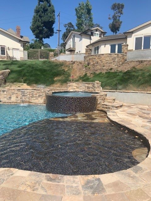 Introduction to Retaining Walls in Custom Pool Construction - Infinite ...